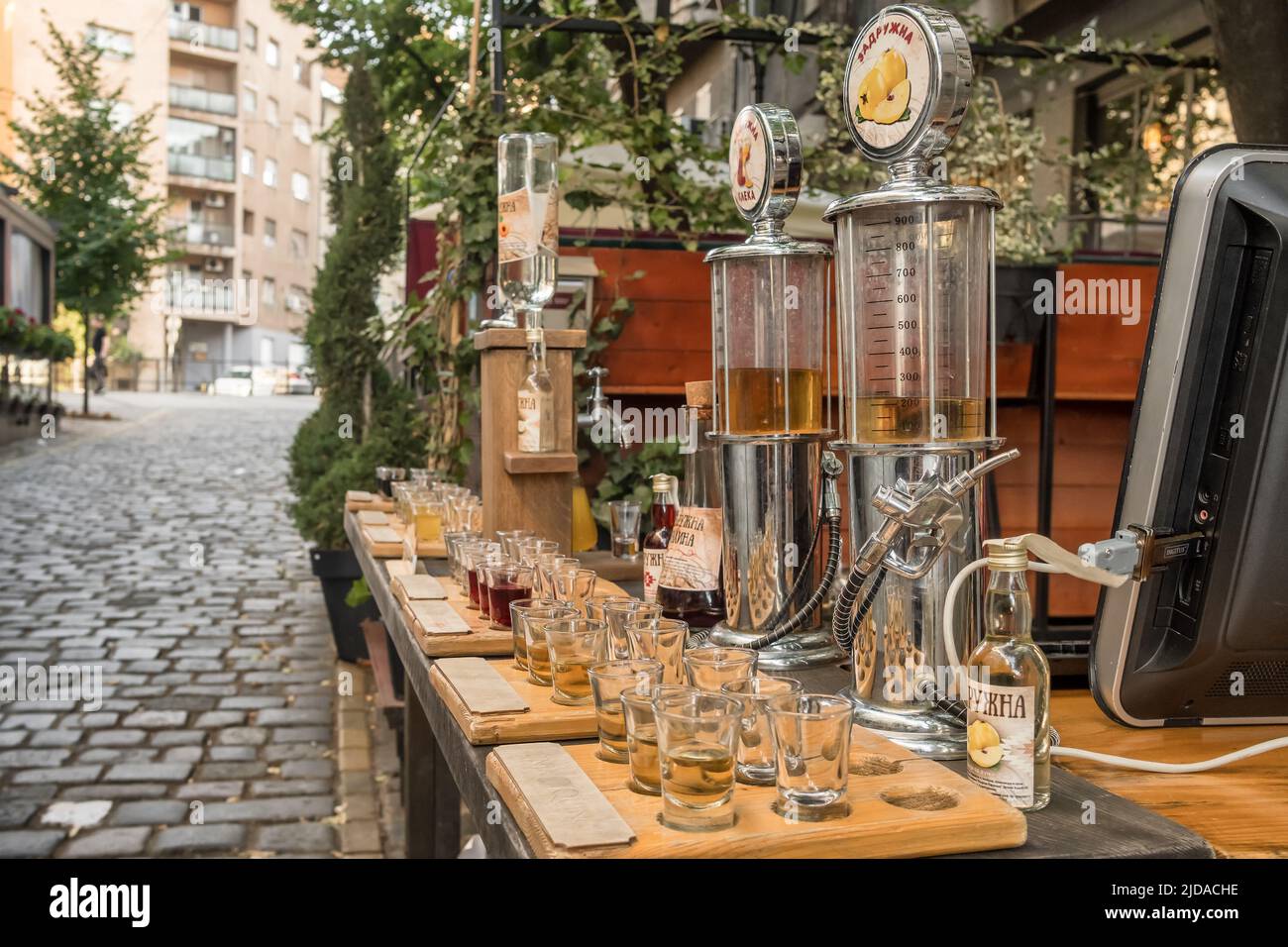 Street bar with traditional serbian homemade liqueurs in Belgrade ...