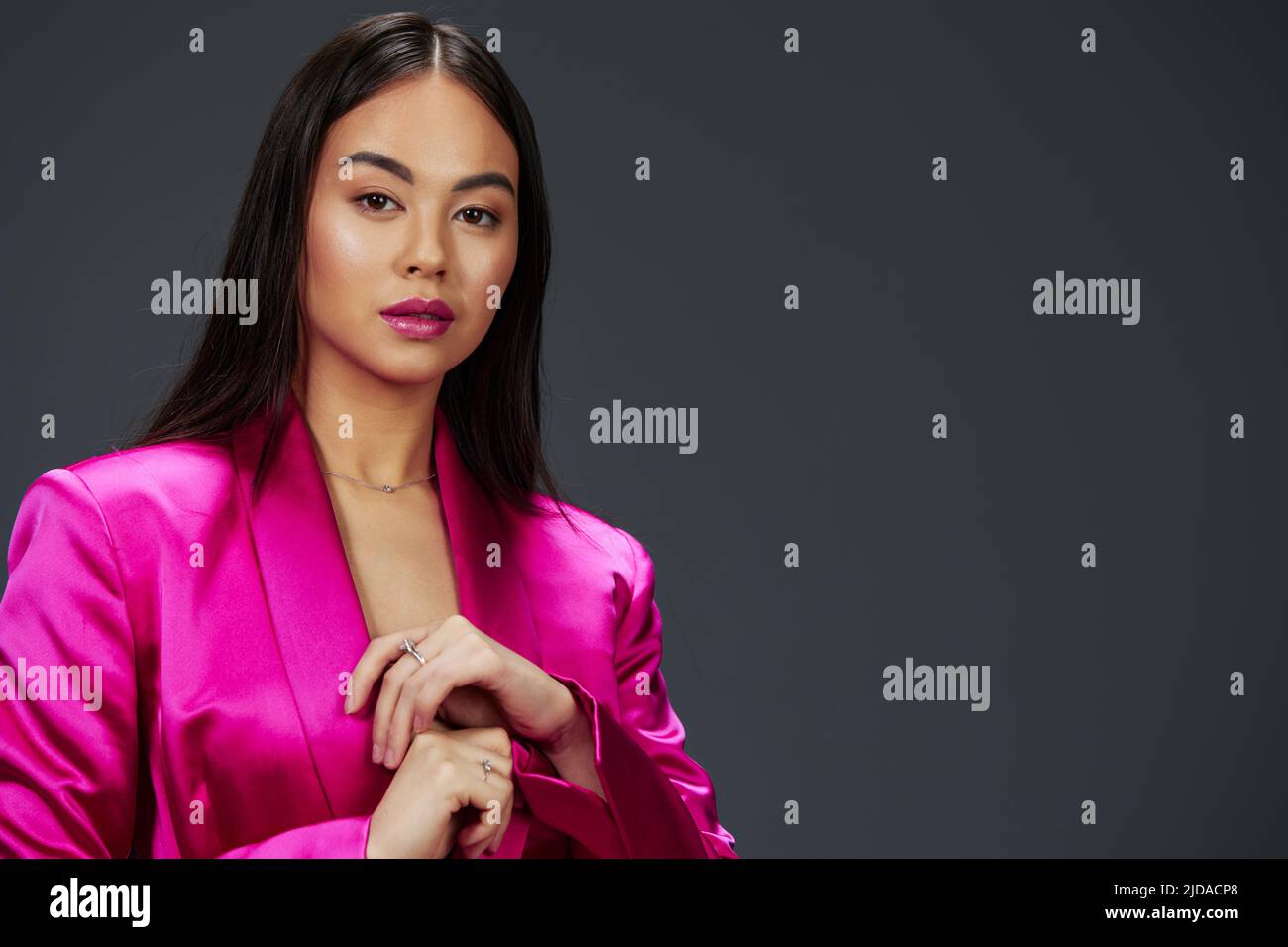 young woman posing pink mini dress charm studio model Stock Photo - Alamy
