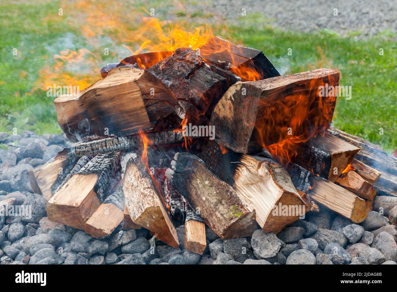 A wood fire with flames Stock Photo - Alamy