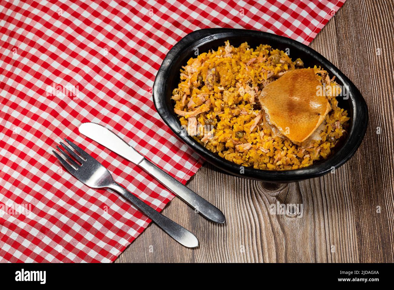 Suckling pig with rice, potato, arepa - Typical Colombian gastronomy ...