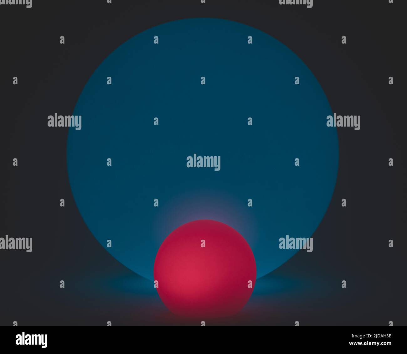 Glowing and illuminated spherical orbs, one large and one small Stock ...