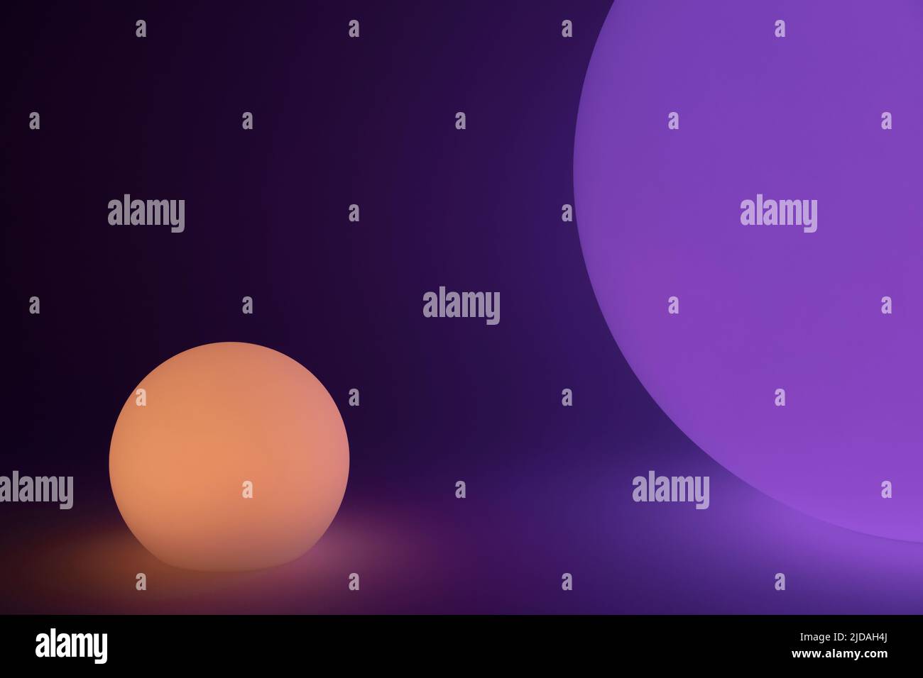 Glowing and illuminated spherical orbs, one large and one small Stock ...