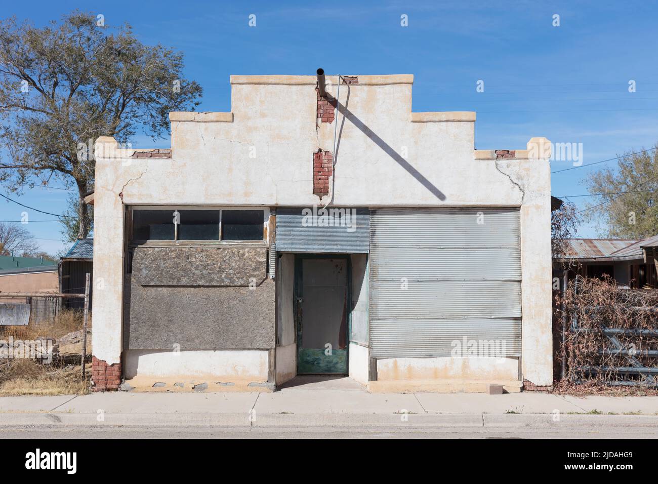 Abandoned and boarded up building in a small town Stock Photo - Alamy