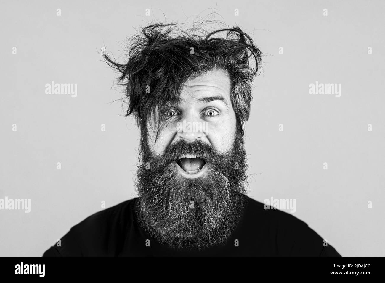 Surprised handsome man. Shocked male model with surprise expression ...