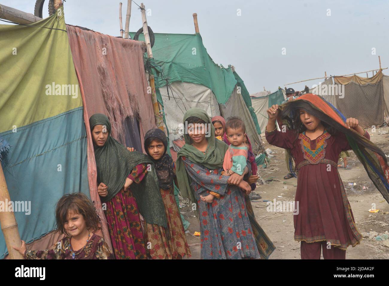 Lahore, Punjab, Pakistan. 19th June, 2022. Afghan refugee family busy in daily routine work ...