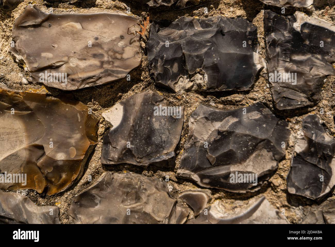 Closeup on various flint stones used in UK as a building material in ...