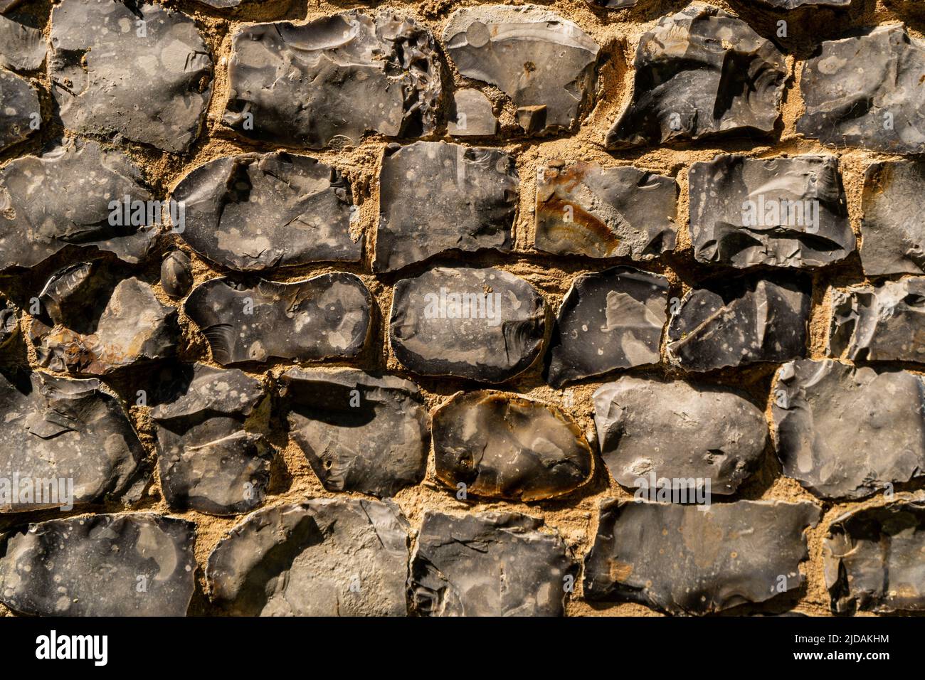 Closeup on various flint stones used in UK as a building material in ...