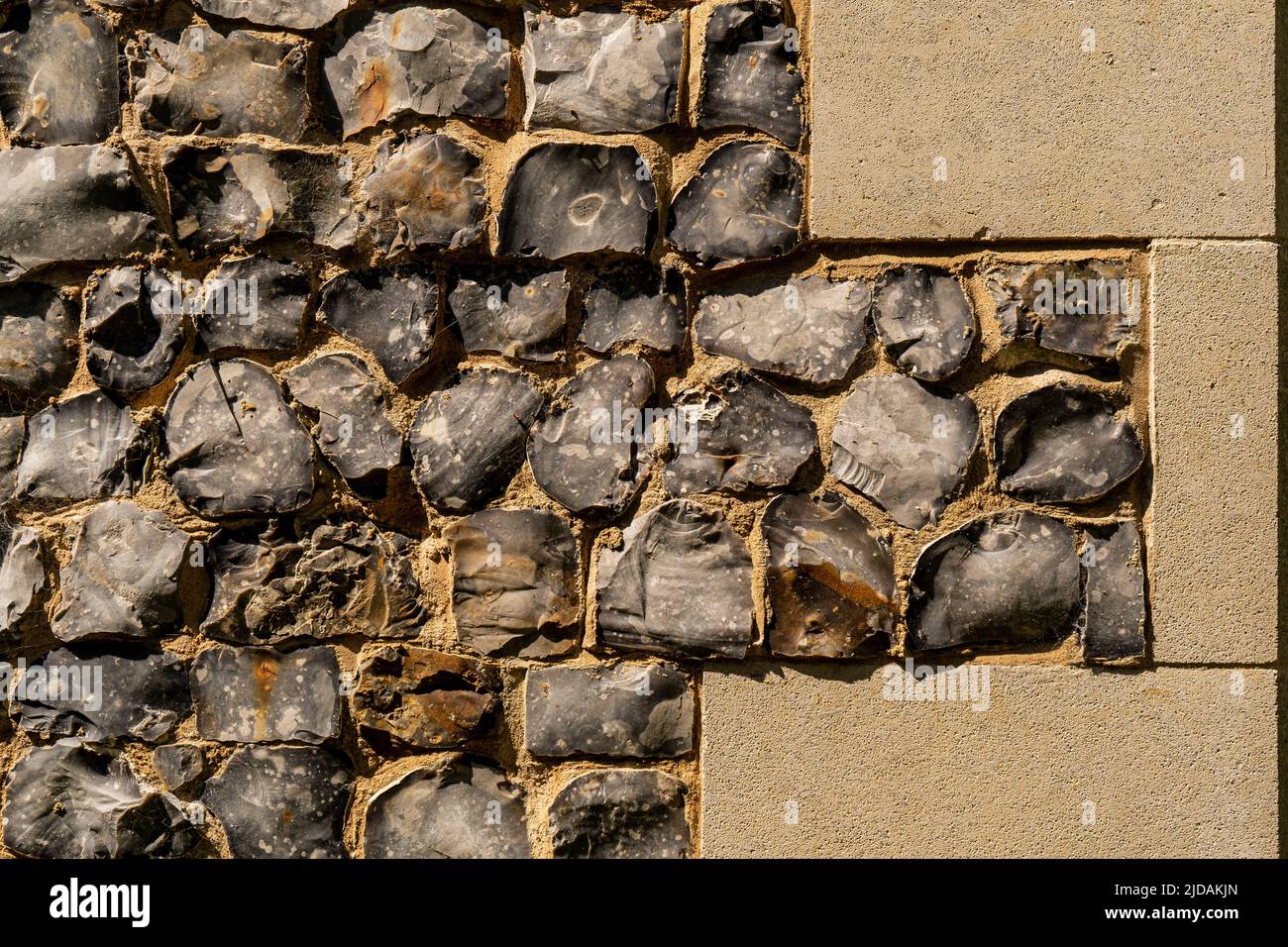 Closeup on various flint stones used in UK as a building material in ...