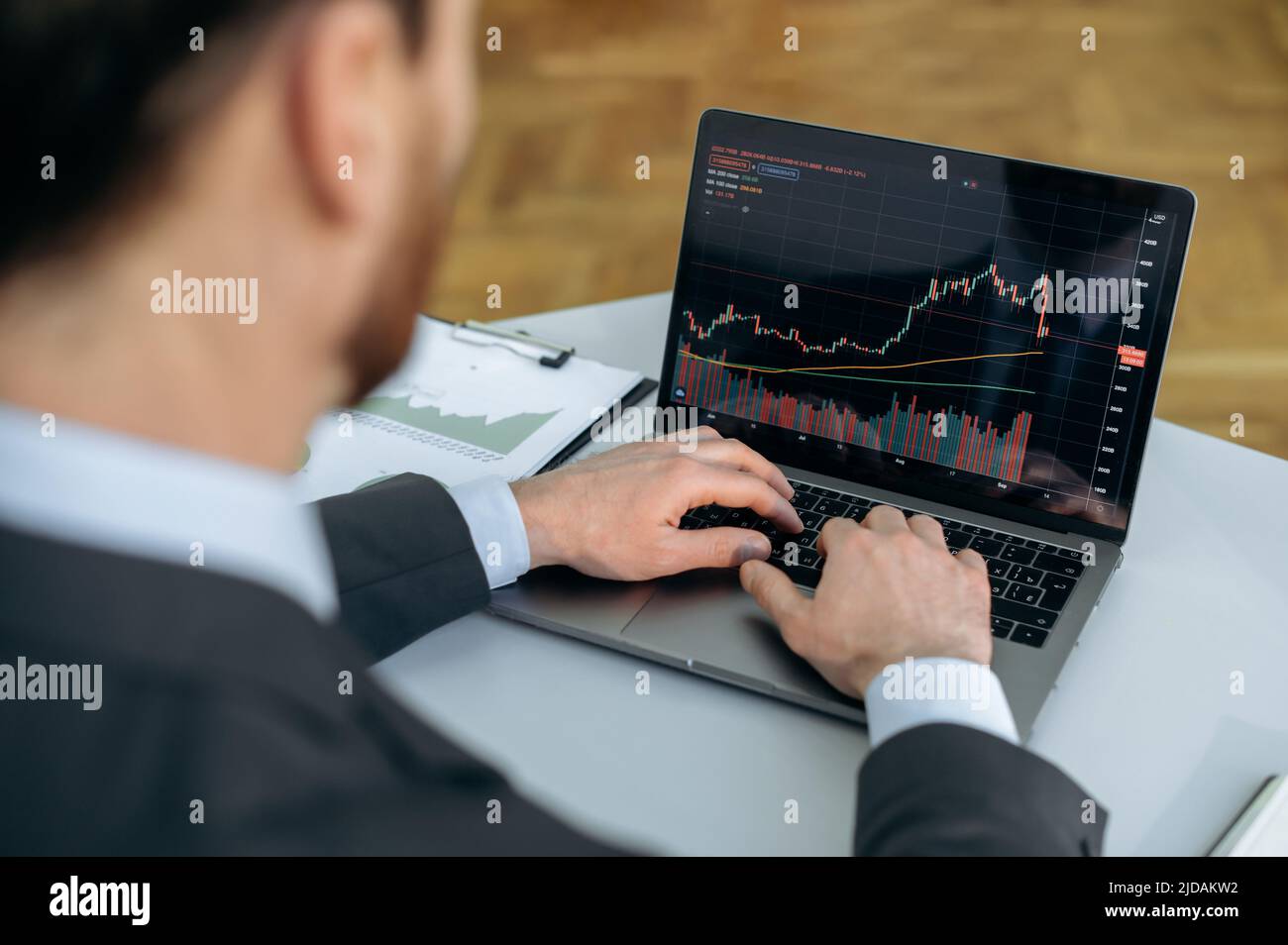 Trading the stock market. Successful smart caucasian businessman, stock ...