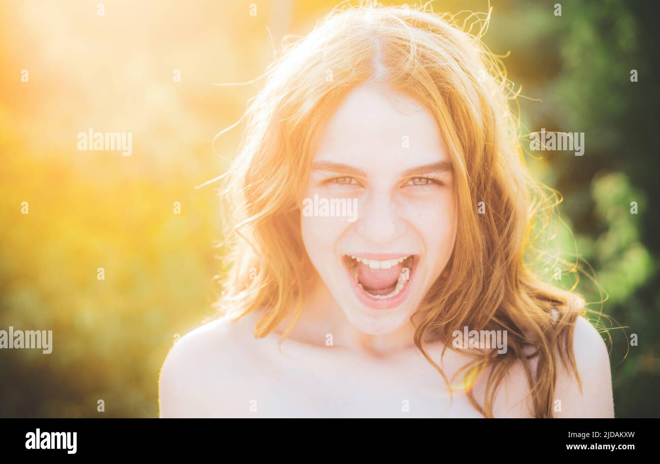 Excited teenagers face close up. Hipster teen girl face with open mouth ...
