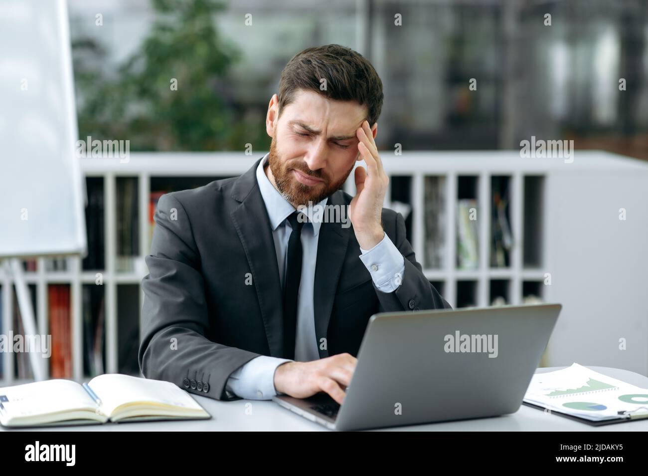 Male employee overworked desk hi-res stock photography and images - Alamy