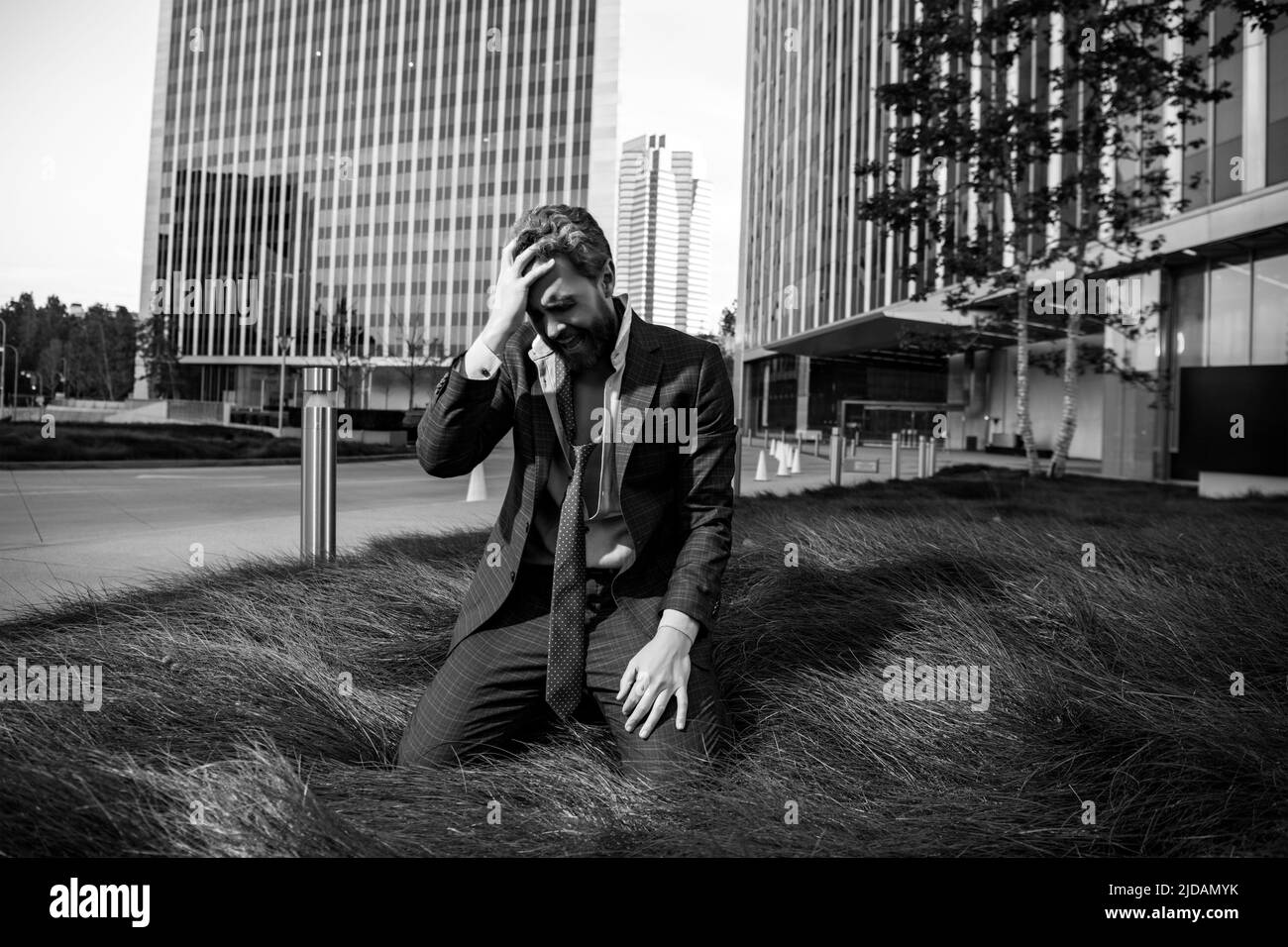 Stressed businessman after project failure. Confused young man ...