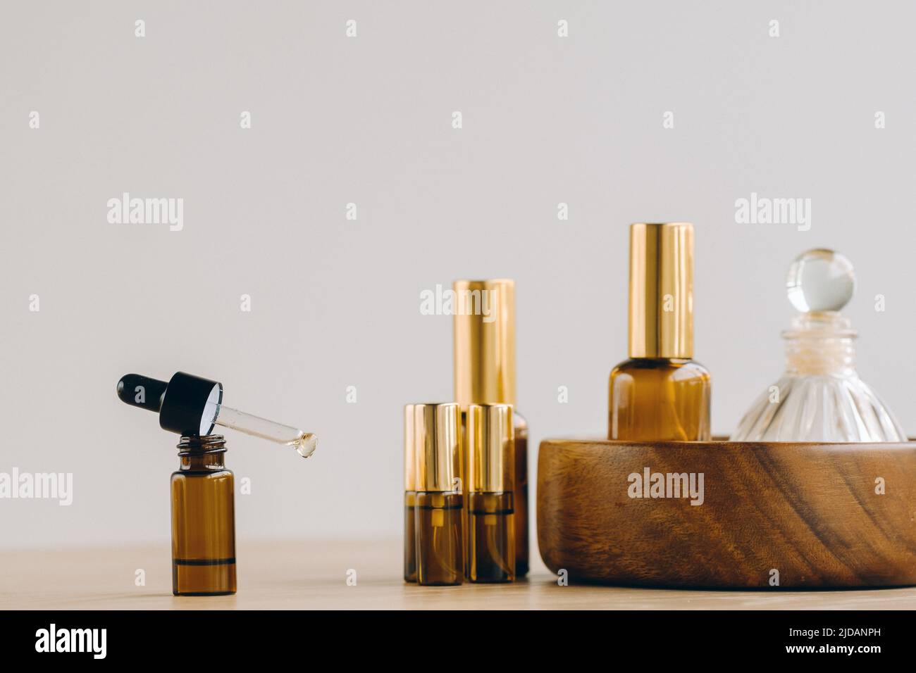 Essential oil in a set of vials. Aromatherapy Stock Photo - Alamy