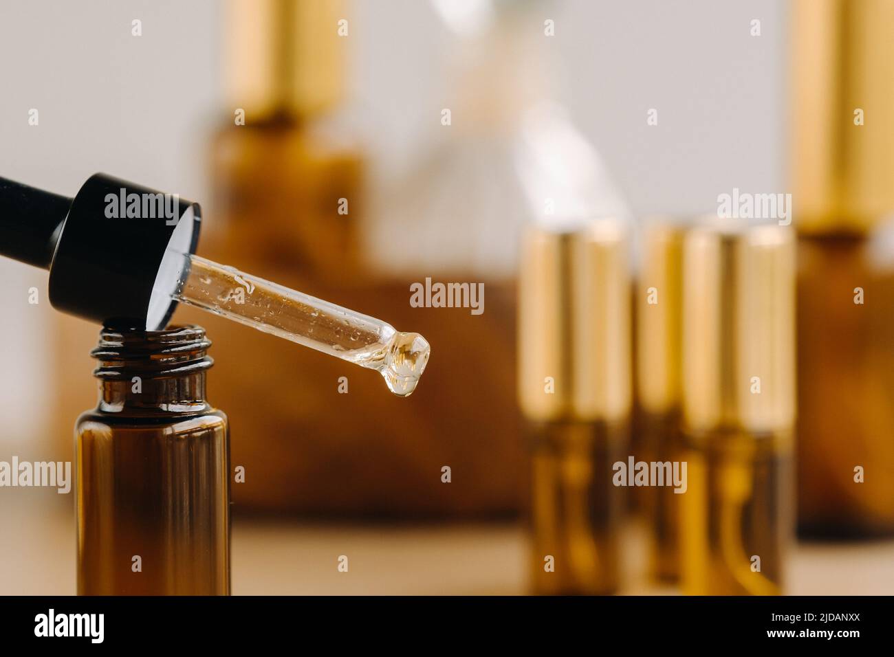 Essential oil in a set of vials. Aromatherapy Stock Photo - Alamy