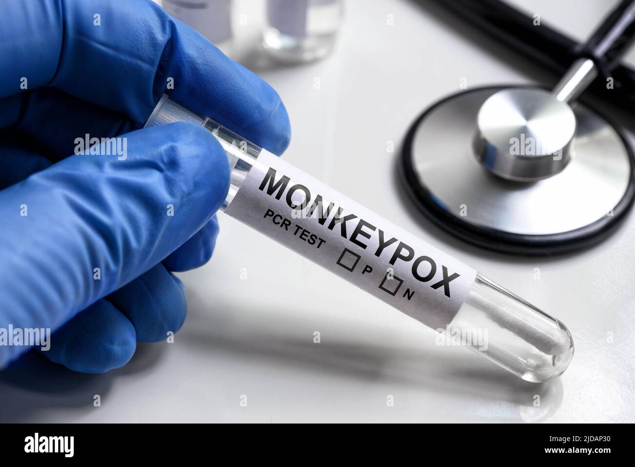 Monkeypox PCR test tube in doctors hand, medical kit for monkey pox ...