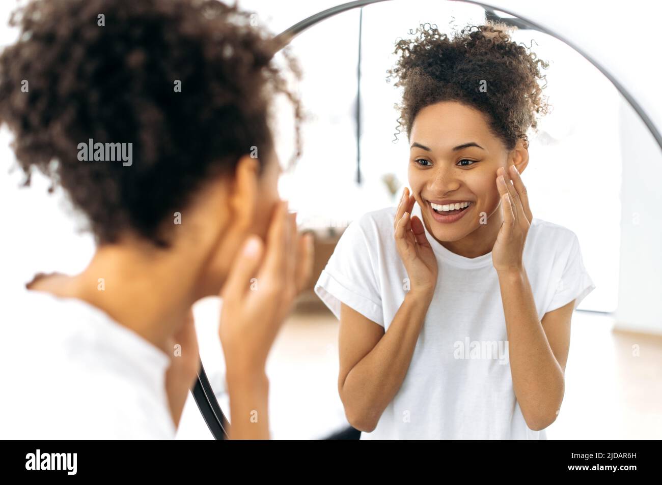 Girl Looking In Mirror Smiling
