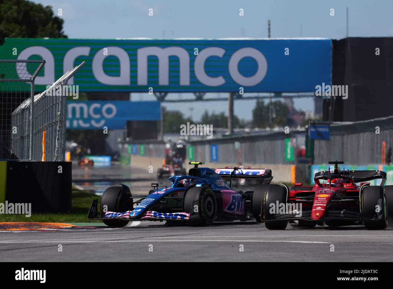 Montreal, Canada. 19th June, 2022. Esteban Ocon (FRA) Alpine F1 Team A522 and Charles Leclerc ...