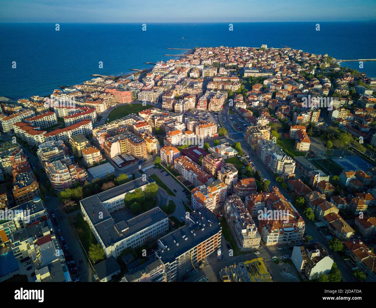 Bird's eye view over small ancient resort town of Pomorie with old ...