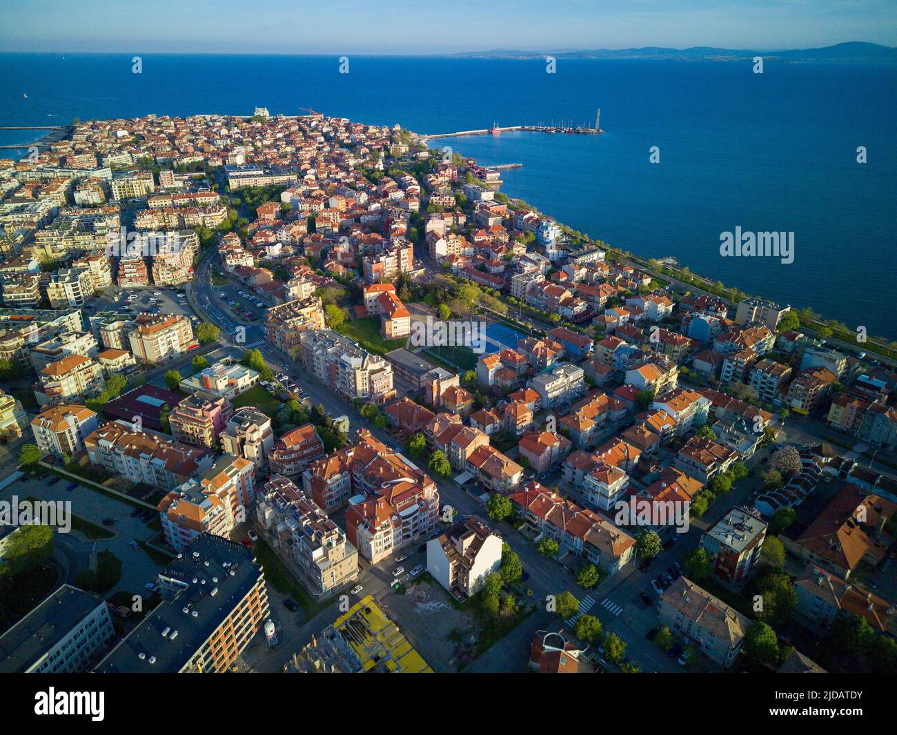 Bird's eye view over small ancient resort town of Pomorie with old ...