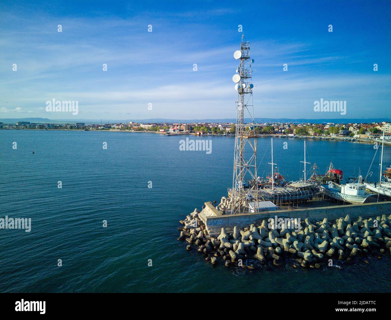 Working modern marine radar station located in a sea small concrete ...