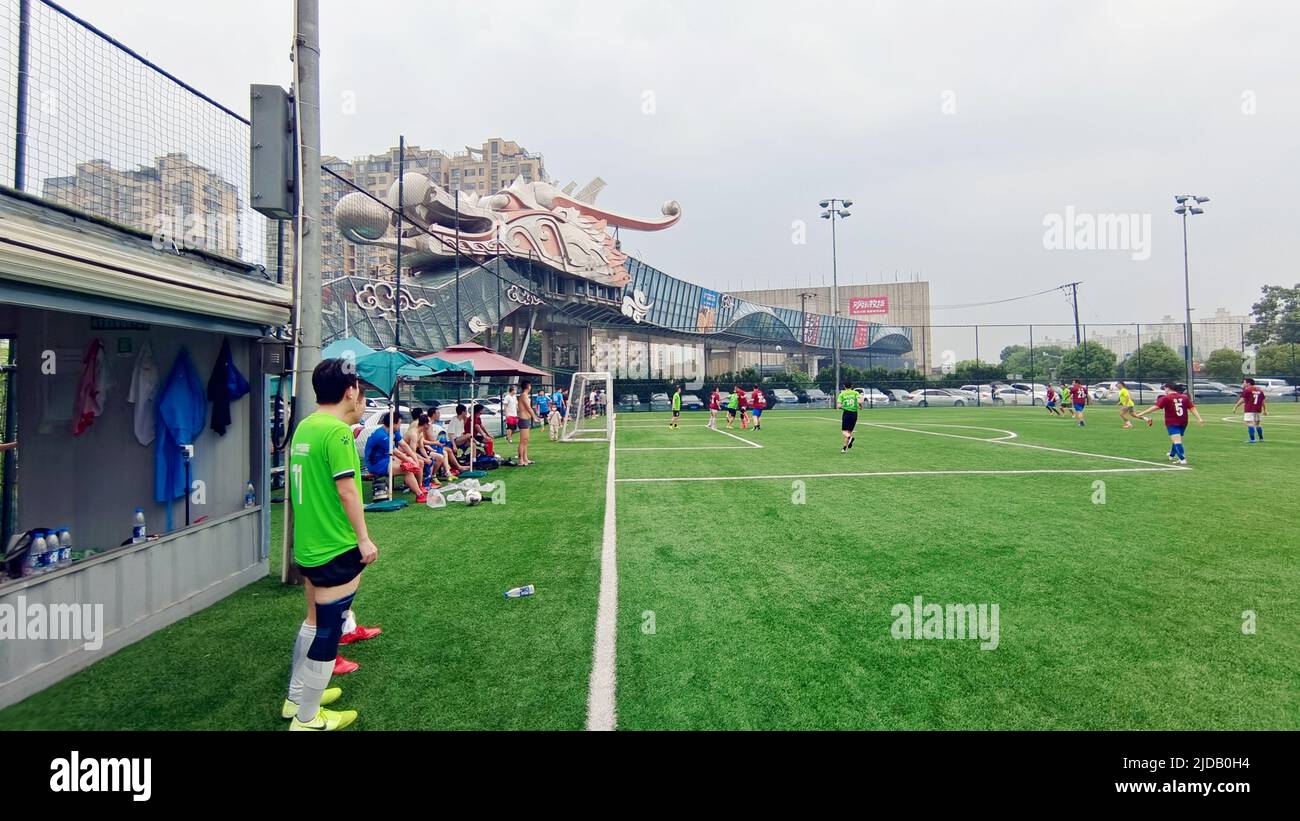 SHANGHAI, CHINA - JUNE 19, 2022 - Fans play football at the "Giant ...