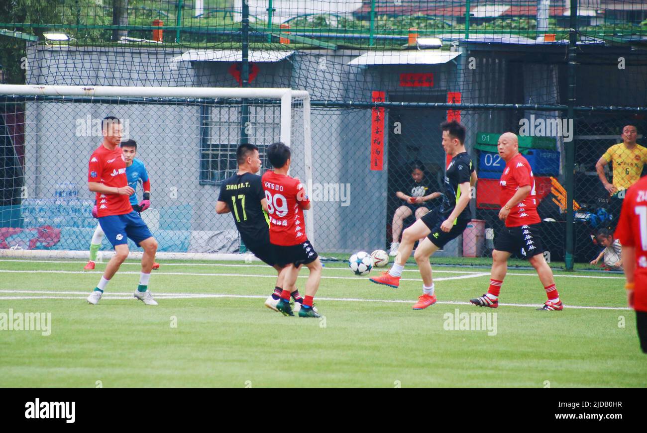SHANGHAI, CHINA - JUNE 19, 2022 - Fans play football at the "Giant ...