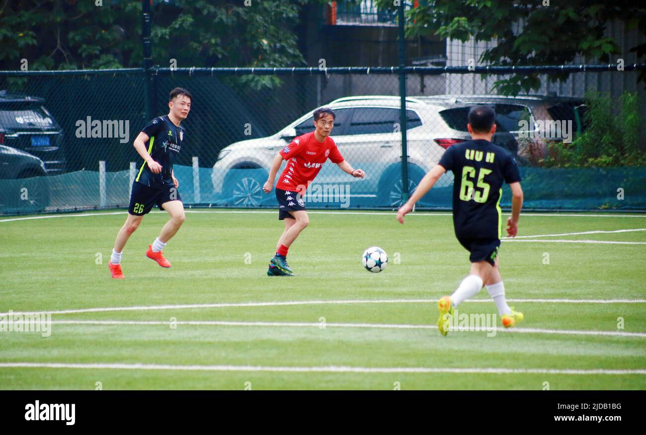 SHANGHAI, CHINA - JUNE 19, 2022 - Fans play football at the "Giant ...