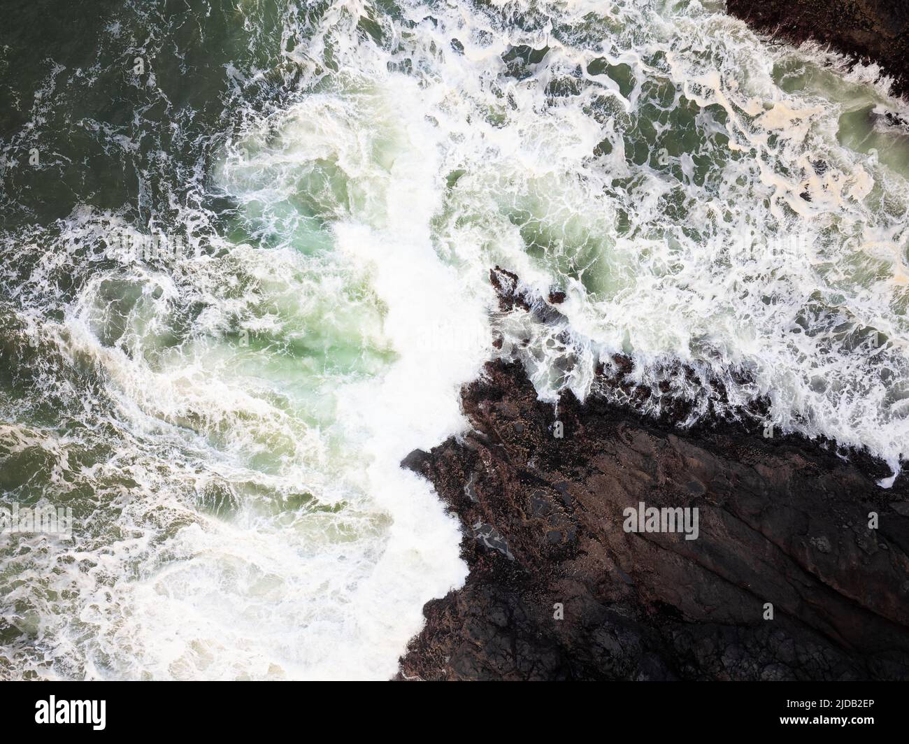 View from above. Raging ocean. Storm. White foamy waves break on the ...