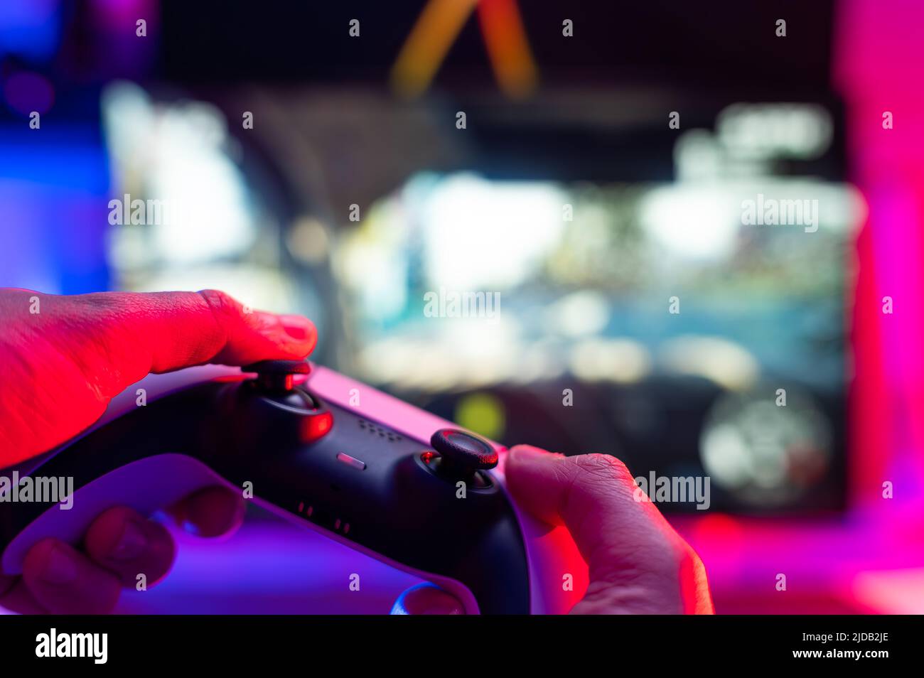 Video games. Joystick in the hands of a man. Close-up. Virtual reality ...