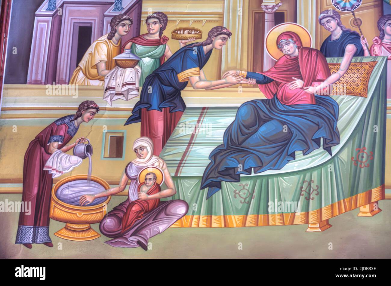 Close-up of colorful religious fresco of the birth of the Virgin Mary ...
