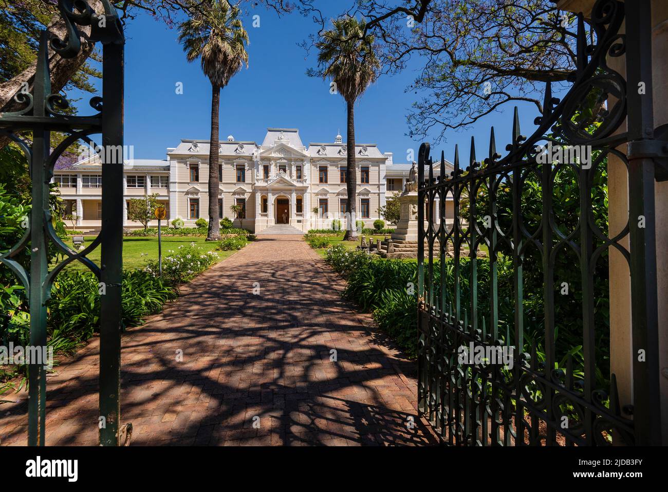 Iron gates and walkway to the entrance of the University of ...
