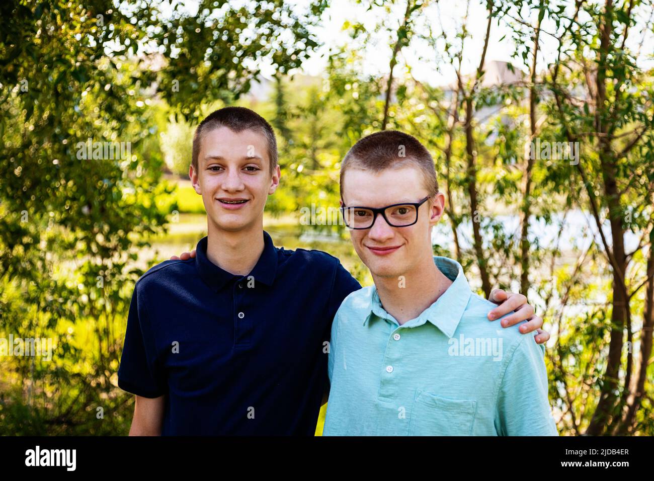 Brothers support hi-res stock photography and images - Alamy