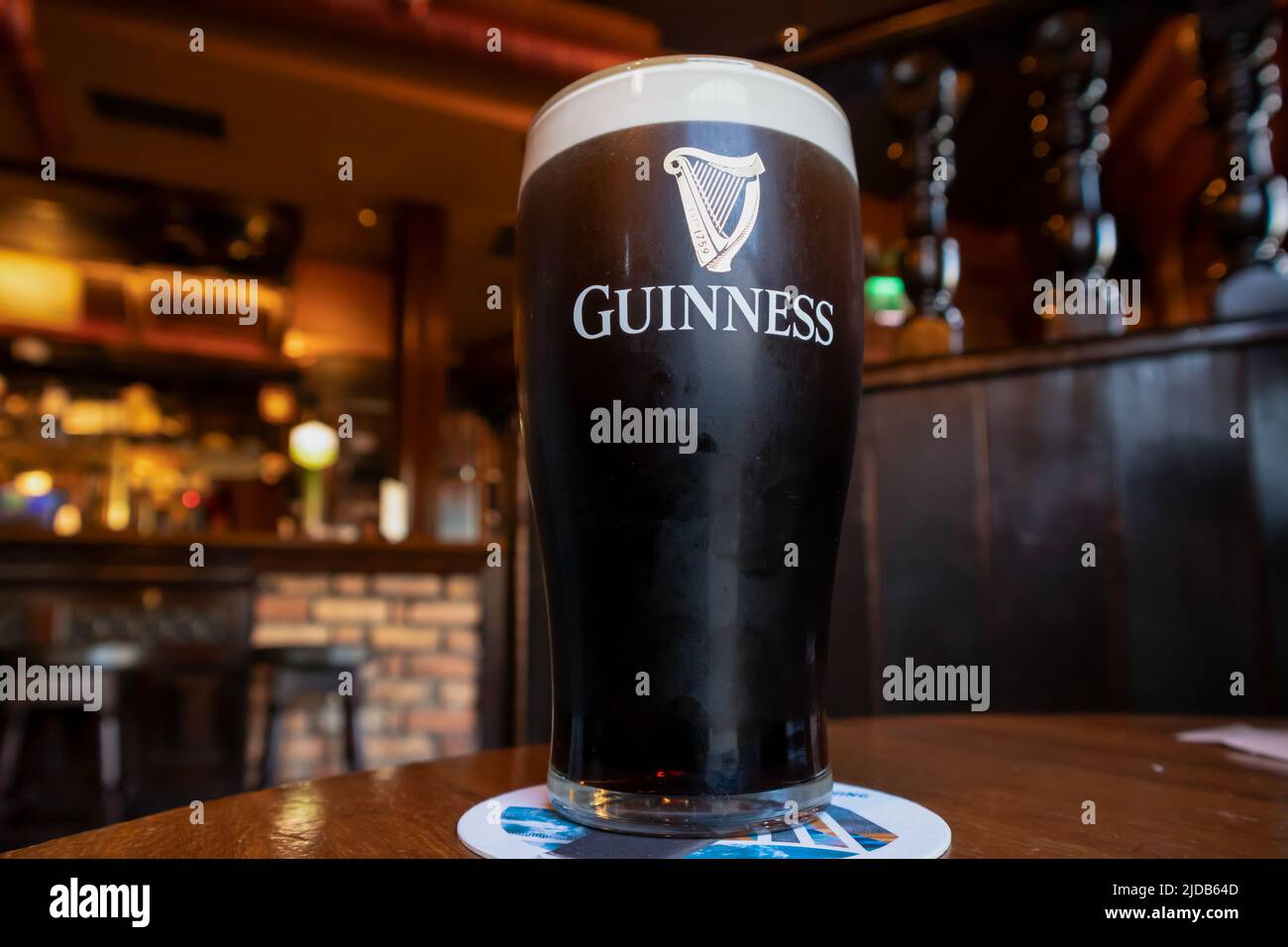 Dublin, Ireland - June 1, 2022: Pints of Guinness served at a pub in ...