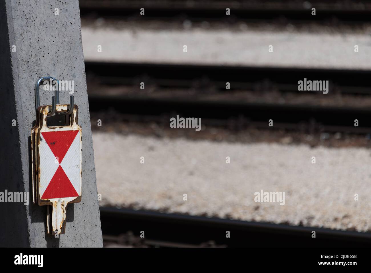 Close up of several metal train end signal sign panels with red white ...