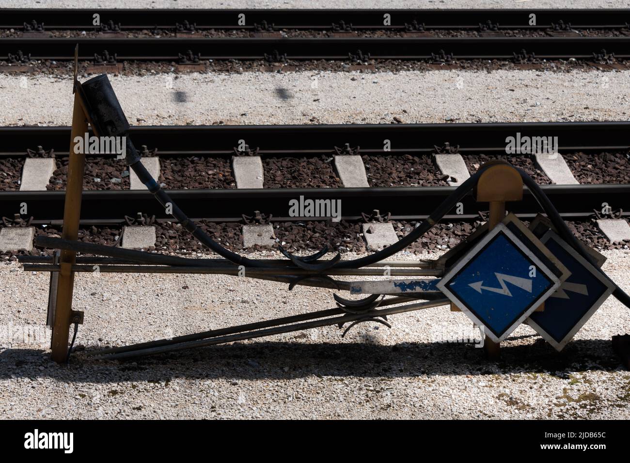 Close up of several metal signs lying sideways indicating electric ...