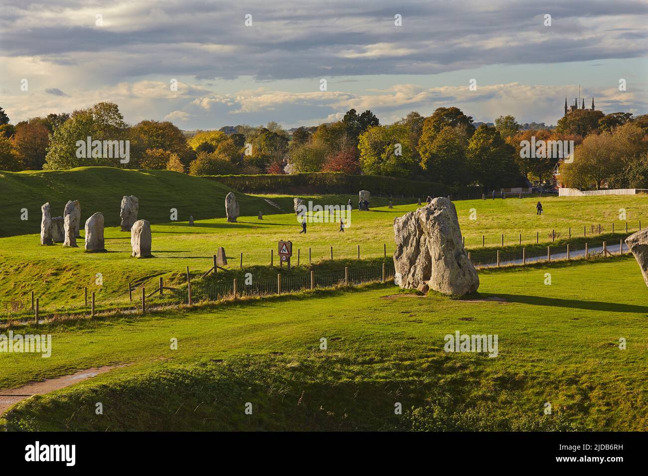 Tourists on the grass at Prehistoric standing stones at Avebury ...