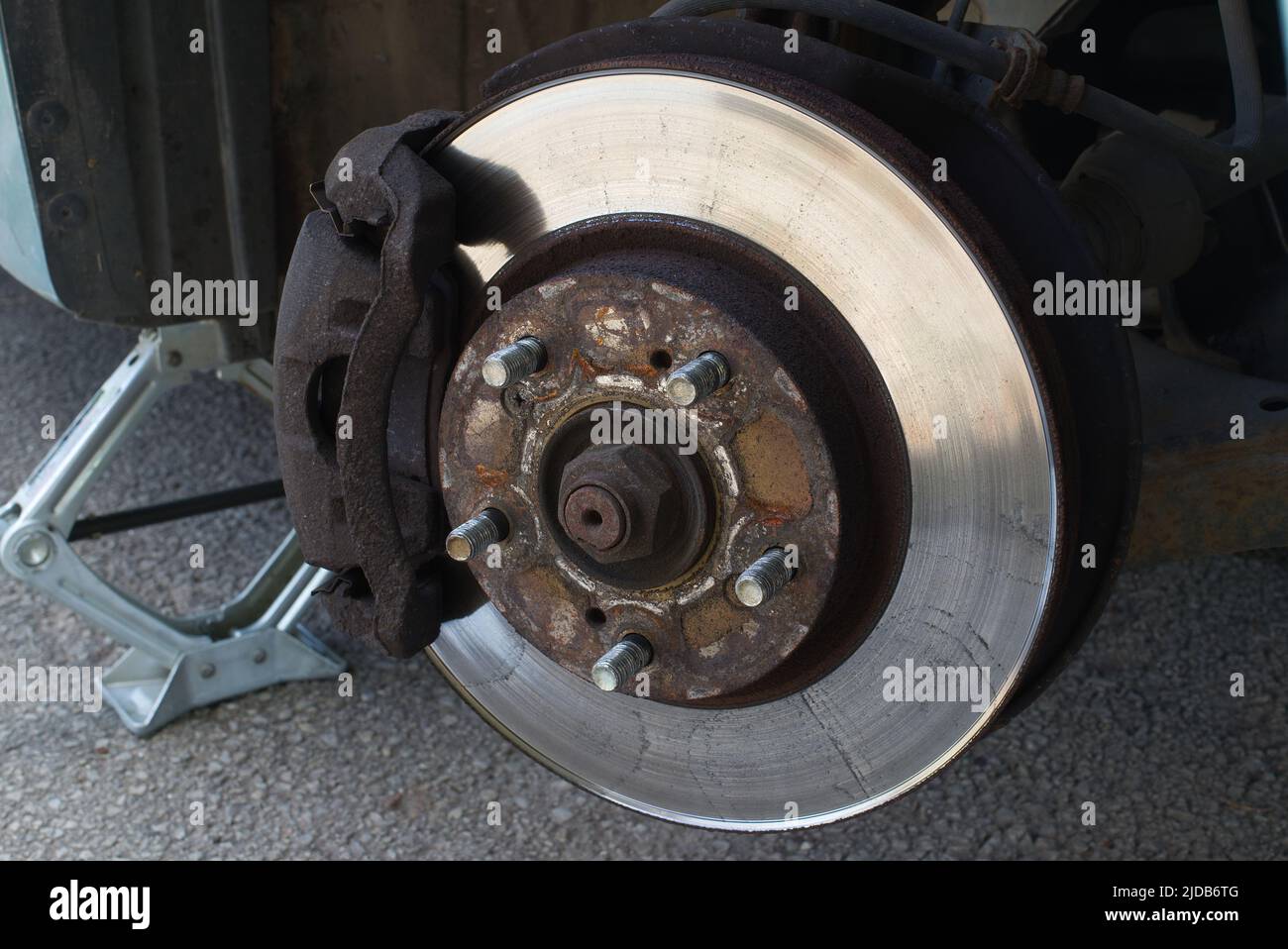 Brake disc rotor without wheels. Automotive industry and garage ...