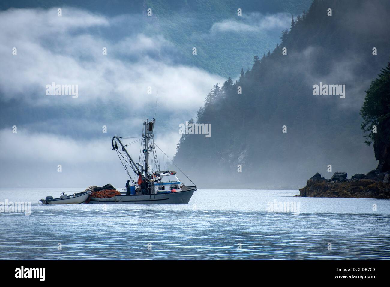Salmon purse seiner and crew work the waters of Kachemak Bay for ...