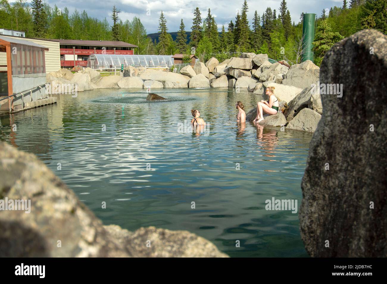 People enjoy the man-made pool at Chena Hot Springs, outside Fairbanks ...