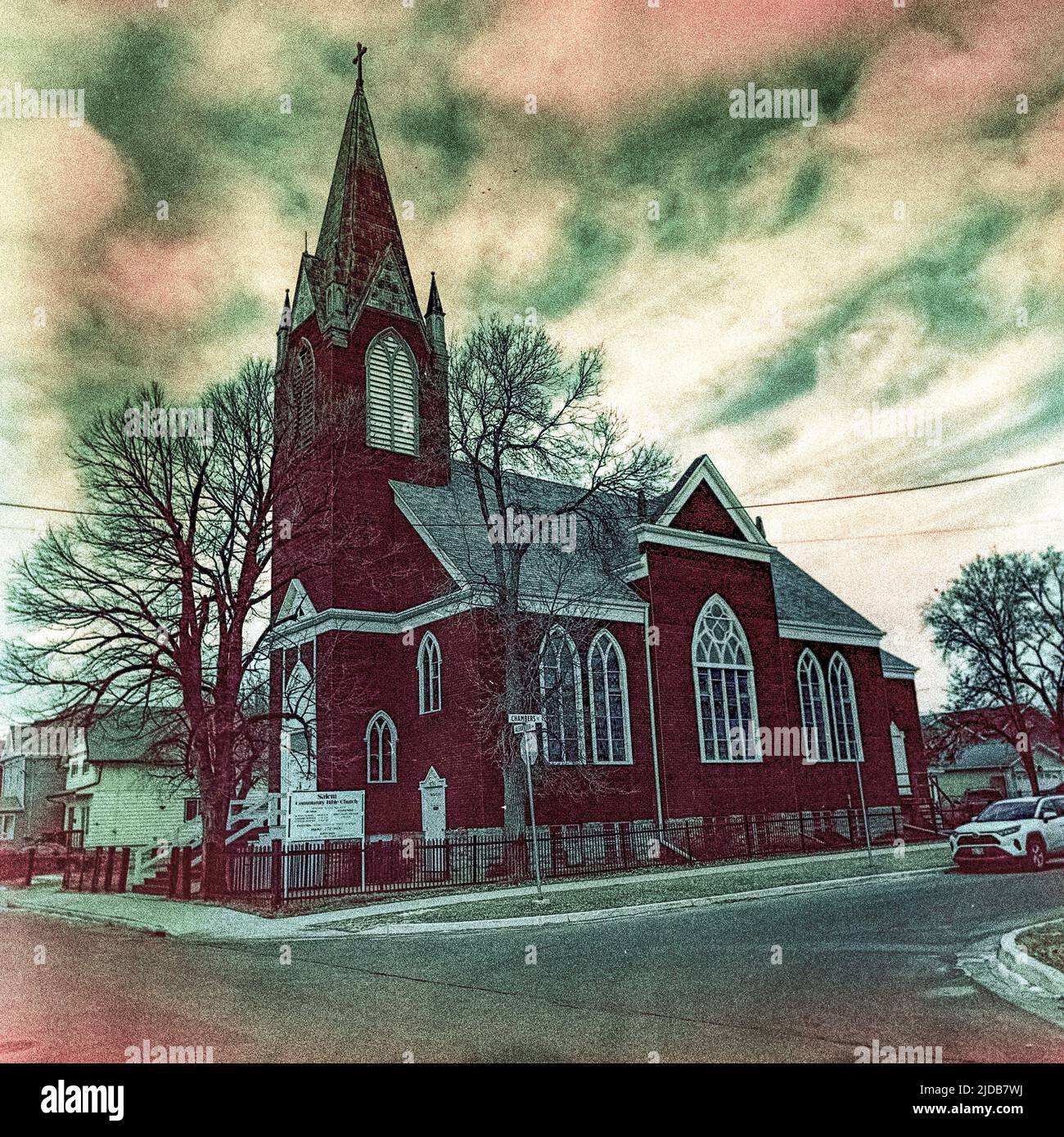 Red church building on a street corner, Salem Community Bible Church ...