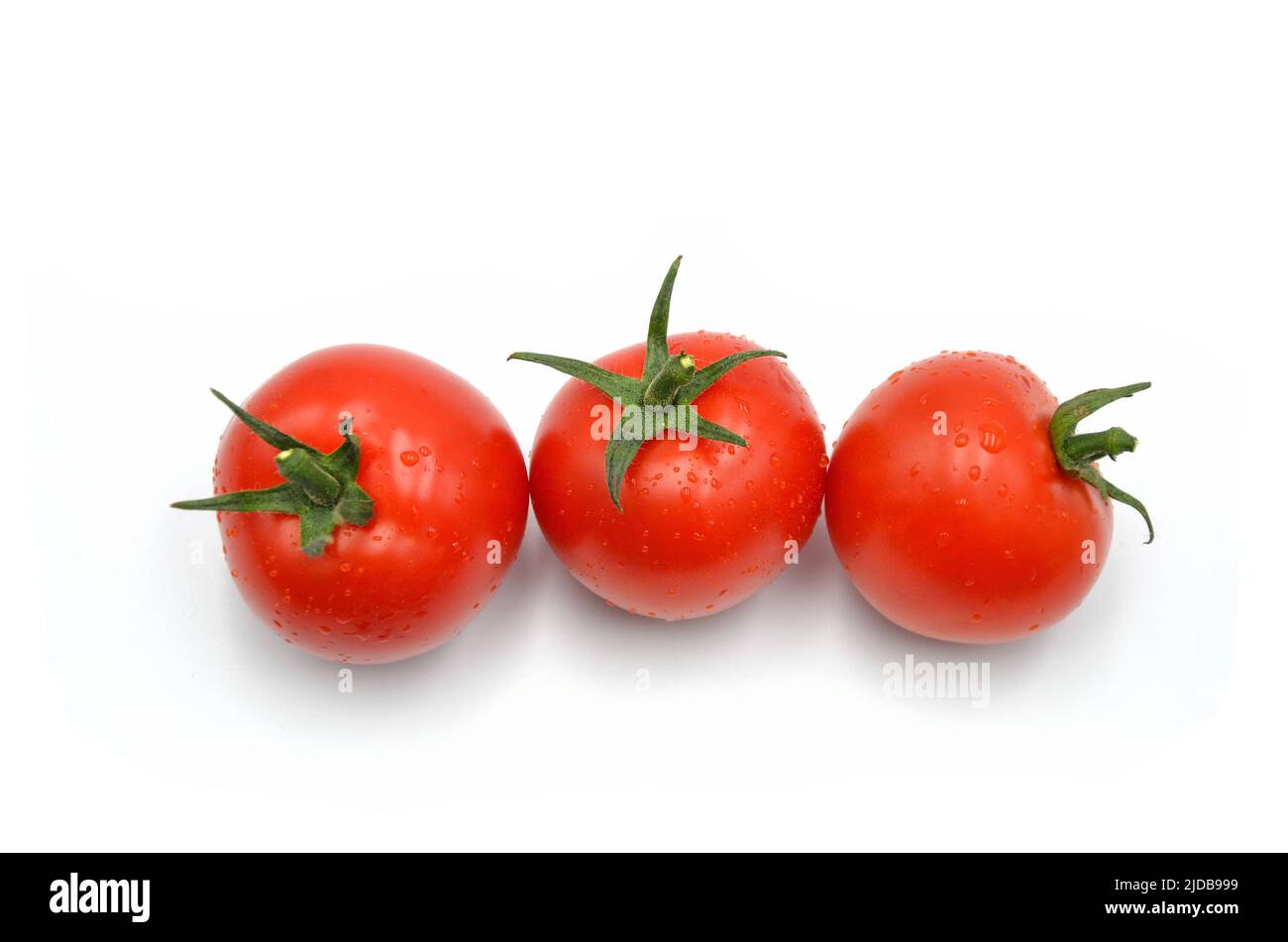 Round cherry tomato half hi-res stock photography and images - Alamy