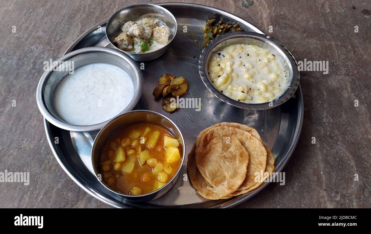 some eatable food put in a steel bowl Stock Photo - Alamy
