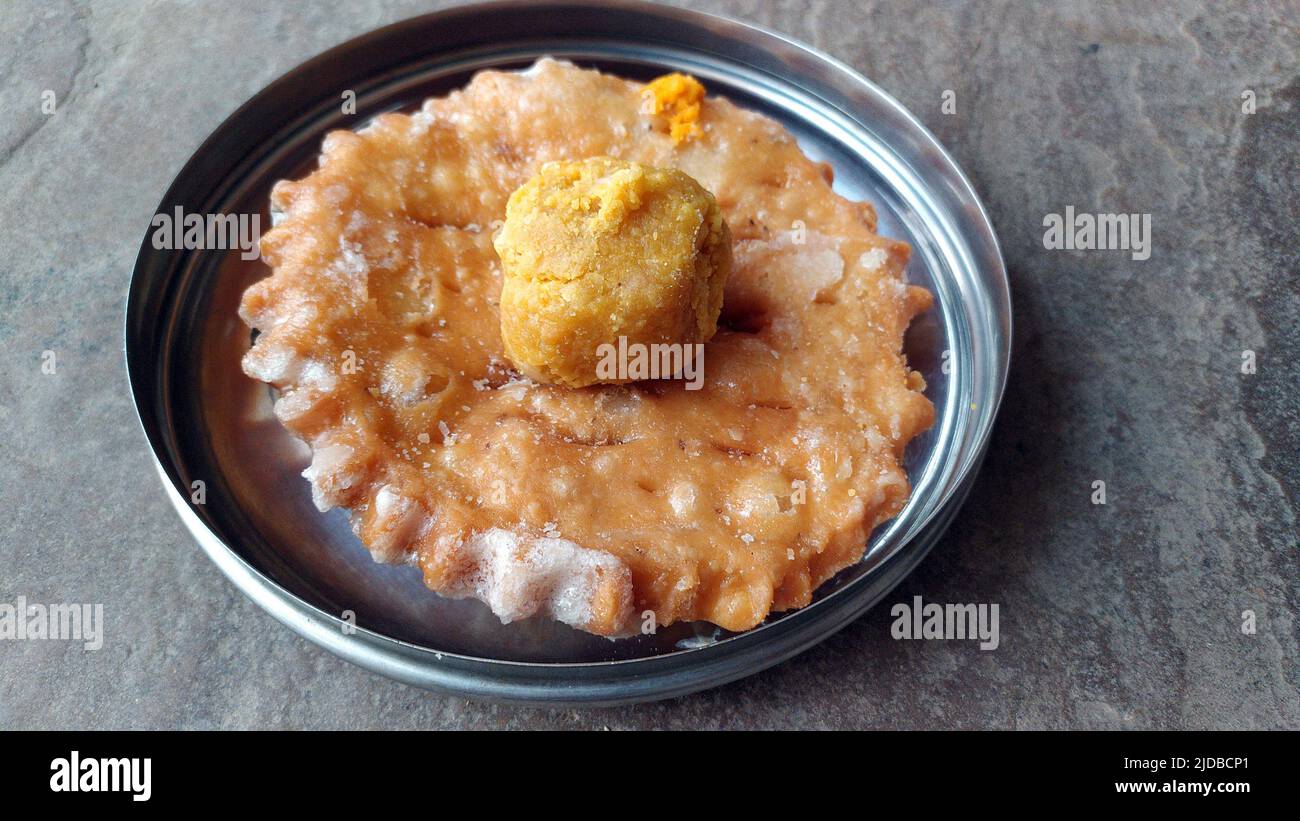 some eatable food put in a steel bowl Stock Photo - Alamy