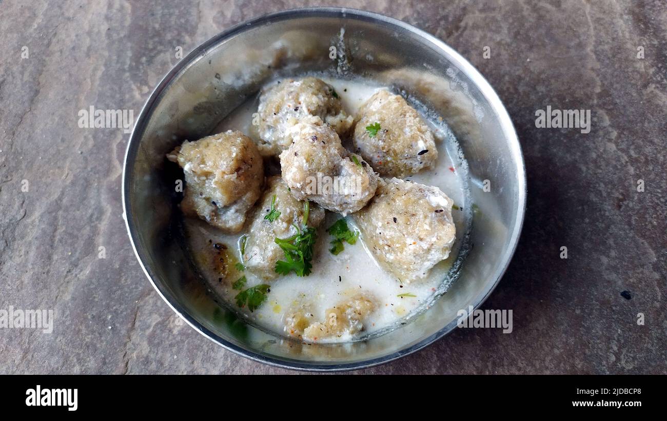 some eatable food put in a steel bowl Stock Photo - Alamy