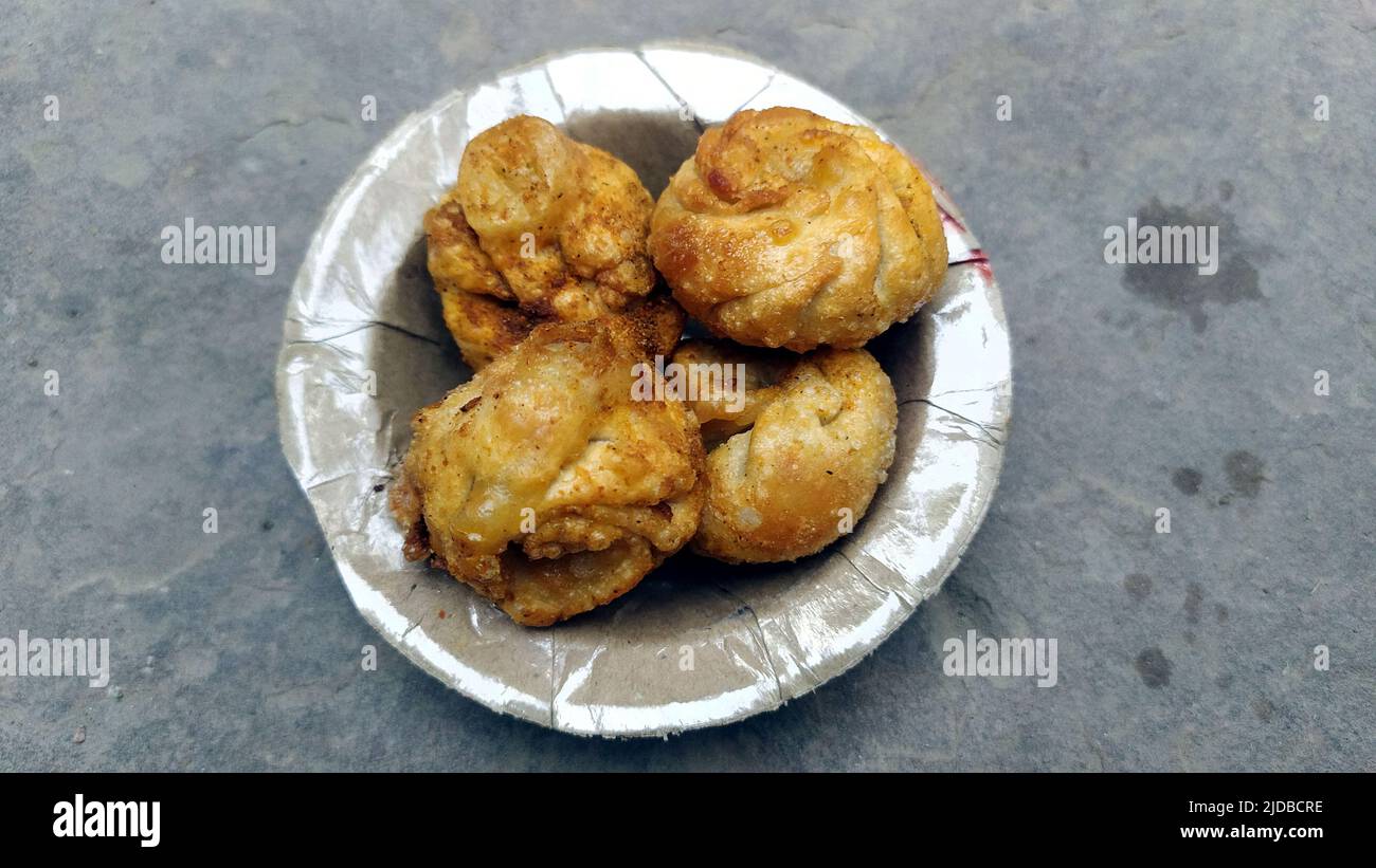 some eatable food put in a steel bowl Stock Photo - Alamy