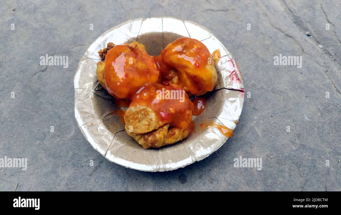 some eatable food put in a steel bowl Stock Photo - Alamy