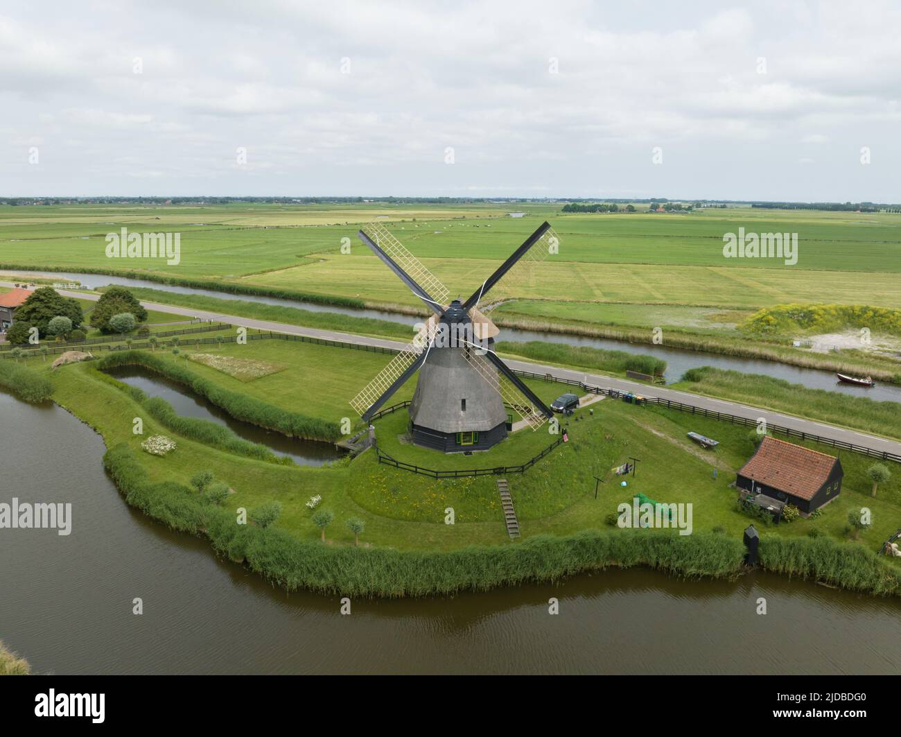 Historic traditional typical dutch old windmills mills on the rural ...