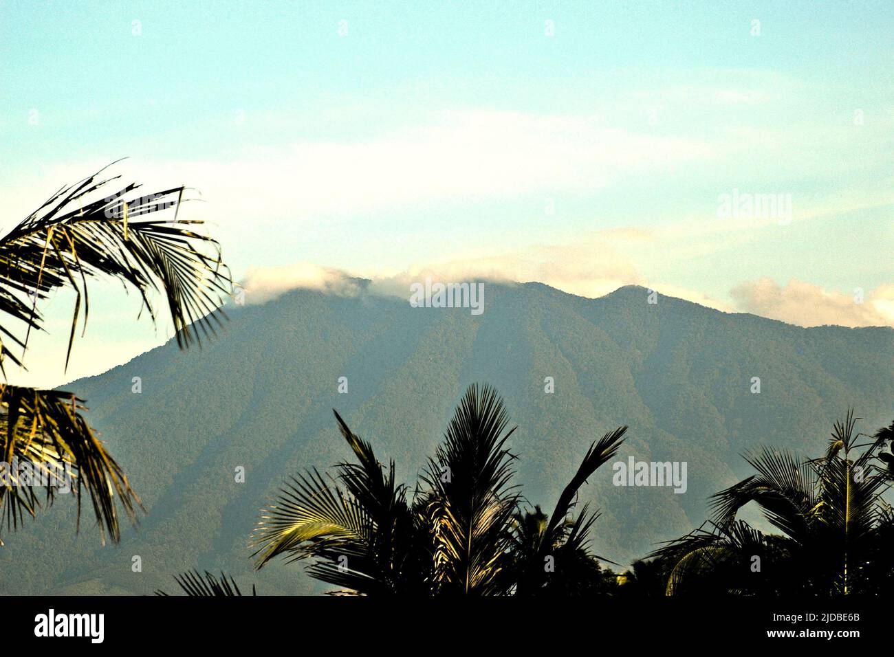 Mount Salak volcano is seen from Benda village in Cicurug, Sukabumi ...