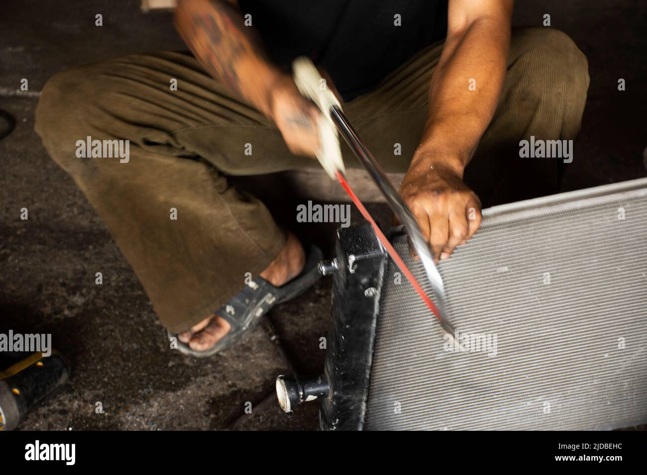Thai men technician professional people use manual hand steel saw tools ...