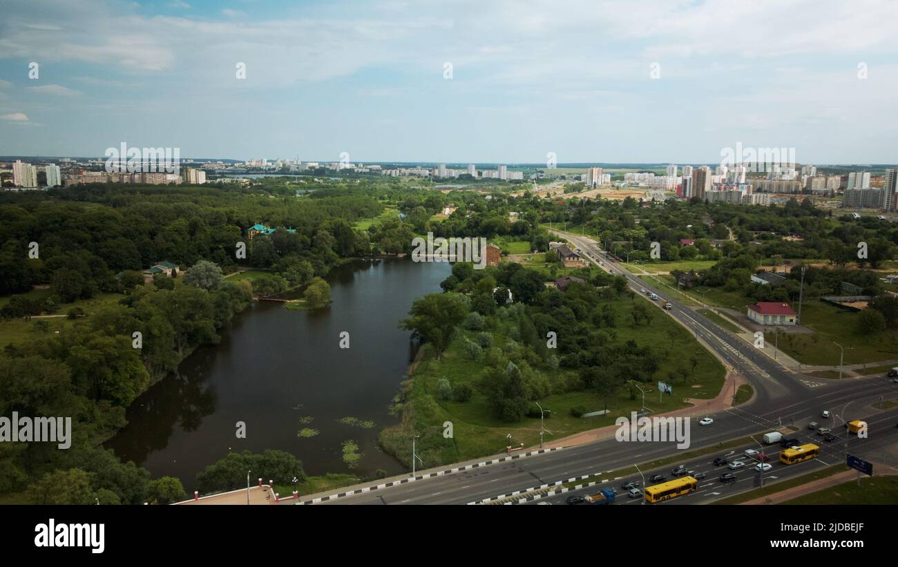 Crossroads of a large city highway. The flow of cars starts moving at a ...